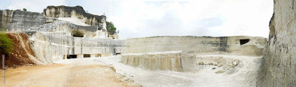 Large quarry for limestone mining mine in jaddih or jeddih hill, madura, east java, indonesia ...