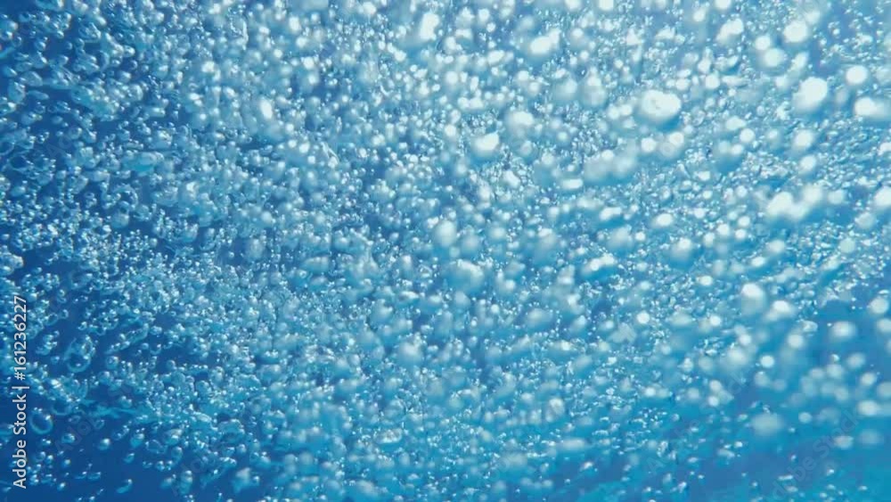 Bubbles rising to the surface. Air bubbles in water in sea (underwater ...