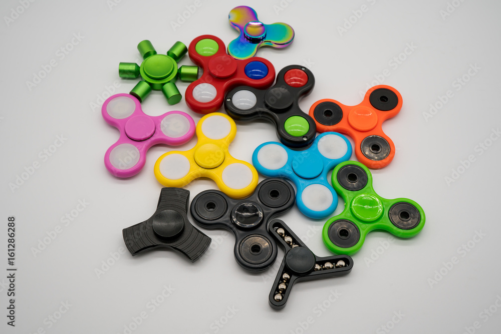 Variety of fidget spinners foto de Stock | Adobe Stock