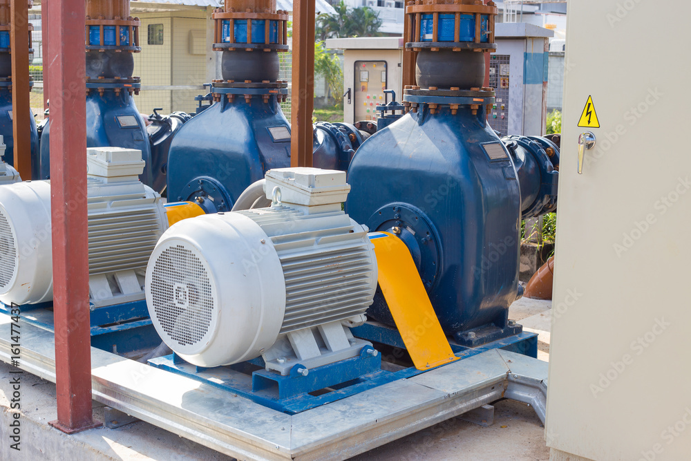 Electric motors driving water pumps of waste water treatment system ...
