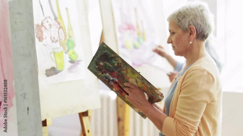 group of students painting at art school studio Stock Video | Adobe Stock