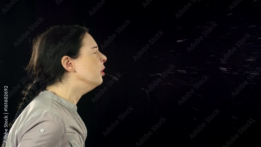 Woman sneezing in slow motion. Stock Video | Adobe Stock