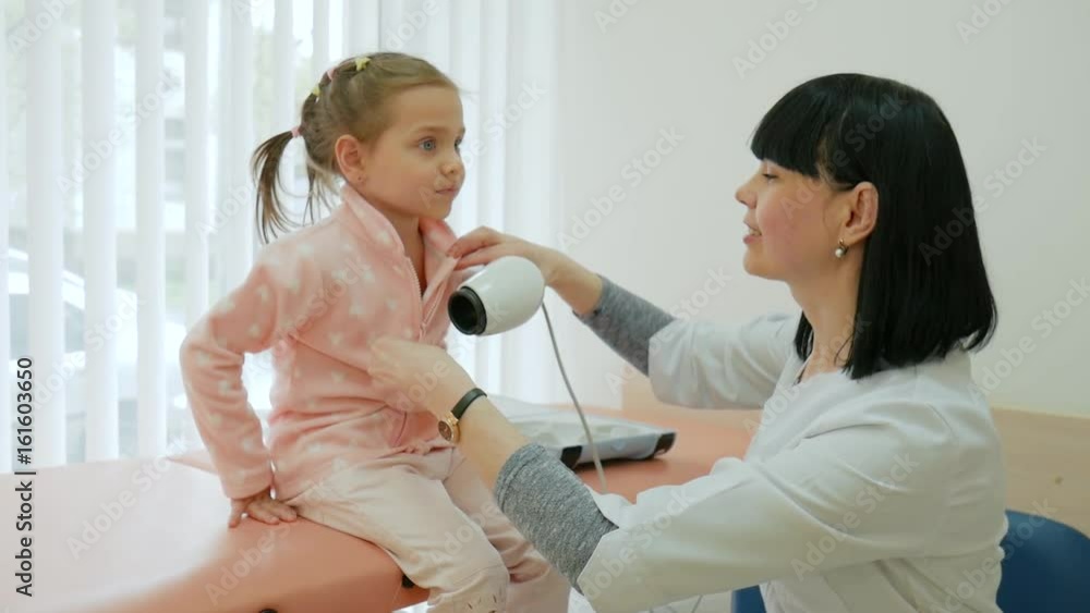 Light therapy, hospital treatment, child at doctor's reception ...