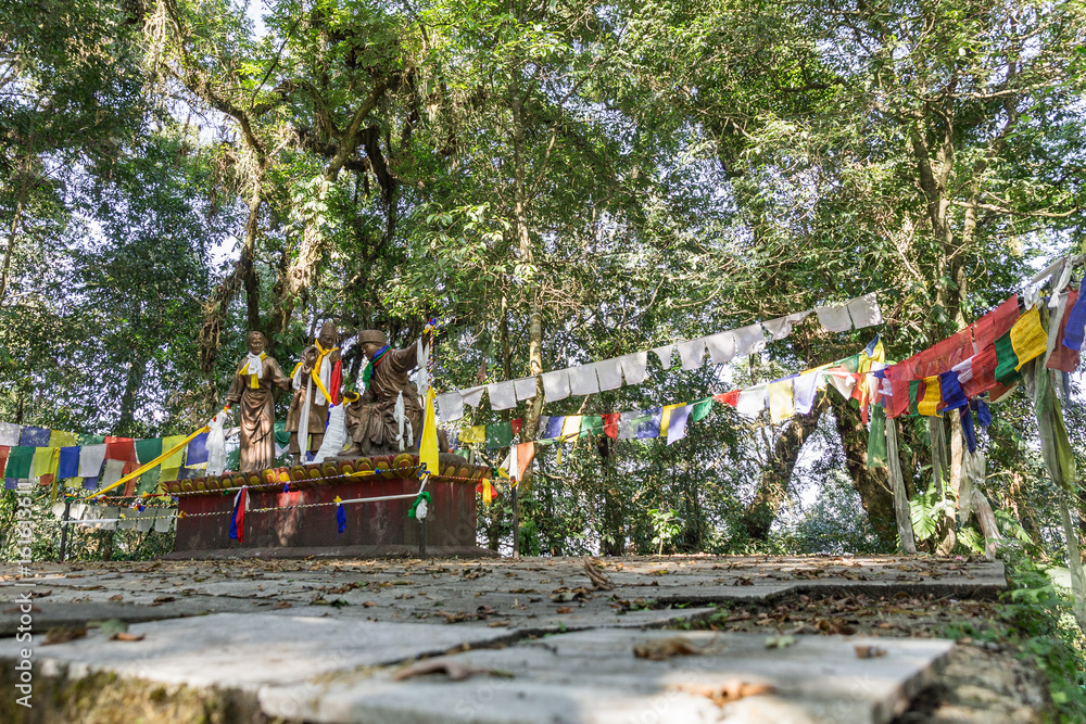 Blood-Brothers statues with Tibetan Buddhist prayer flags in Kabi ...