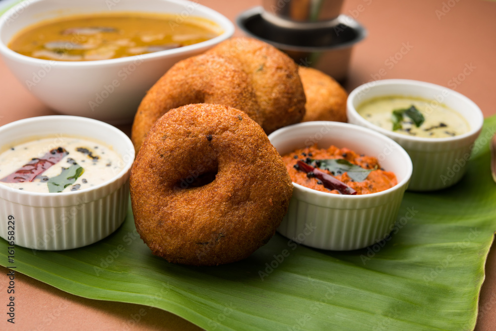 south indian food called vada sambar or sambar vada or wada, served ...
