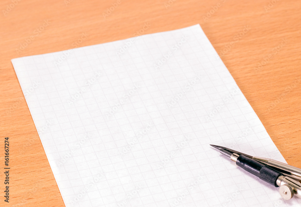 Compass on a blank sheet Stock Photo | Adobe Stock