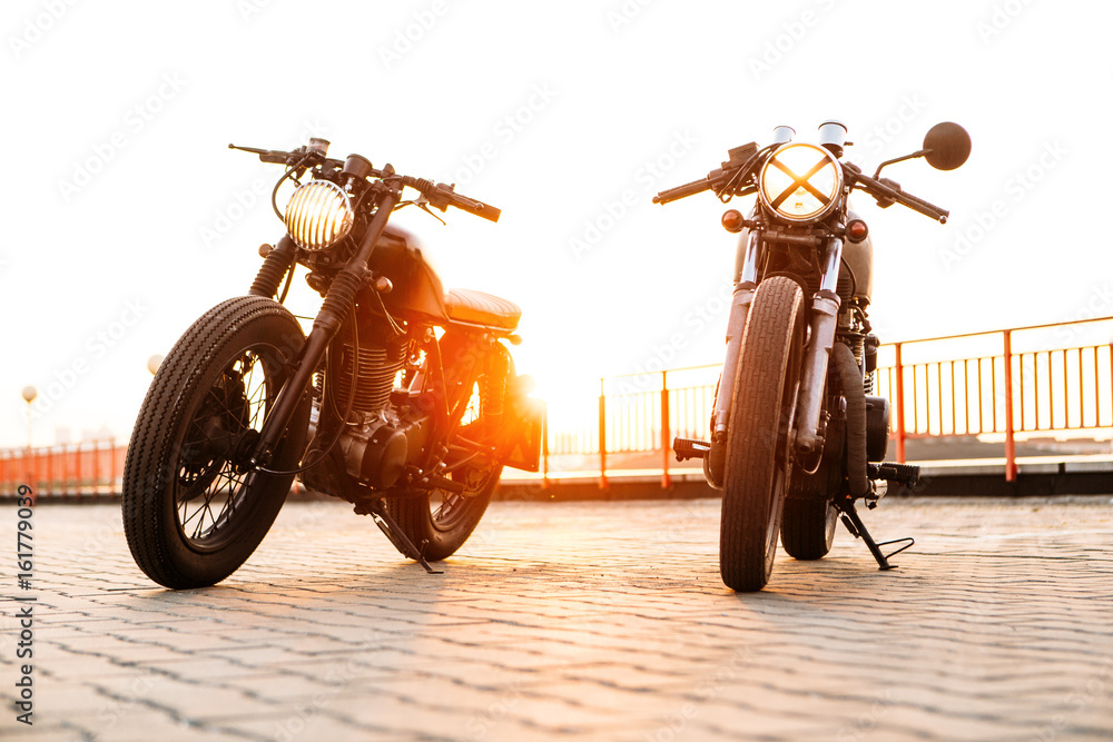 Front view of two vintage custom motorbike caferacer motorcycle one ...