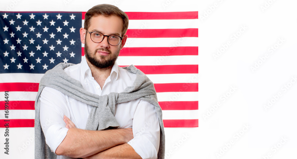 4th of July. Smiling young man on United States flag background. Stock ...