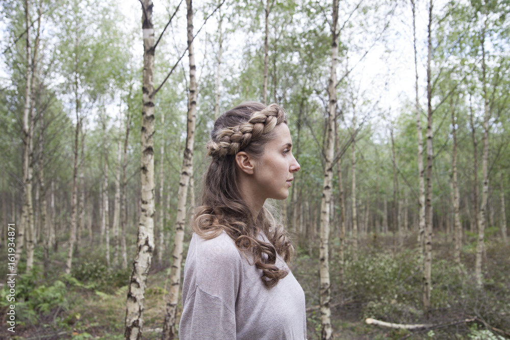 Girl with braid in birchforest Stock Photo | Adobe Stock