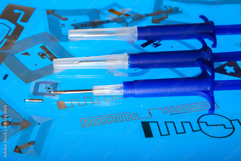 RFID implantation syringes and chips on RFID tags (Radio Frequency ...