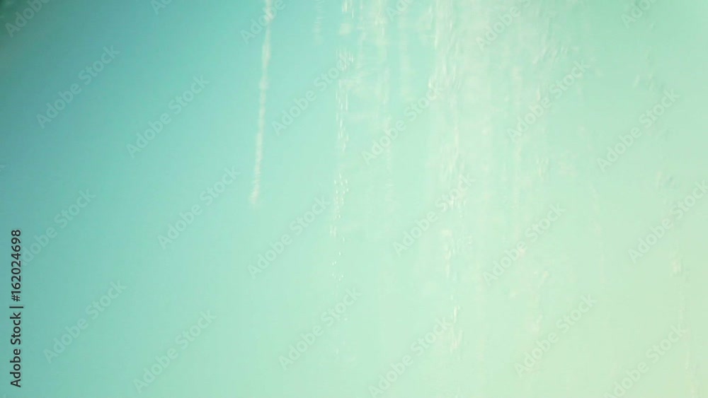 The liquid is turbid white in the glass chemical flask: the texture and ...