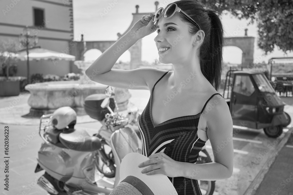 BW photography of a beautiful tourist woman. Italian holiday concept ...