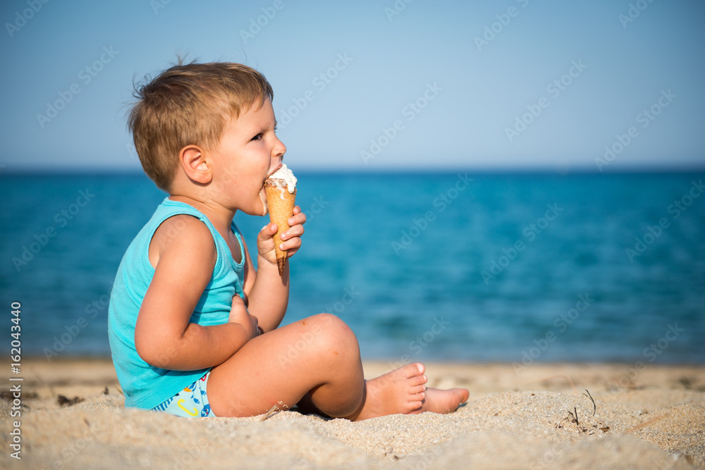 Kids Eating Ice Cream On Beach