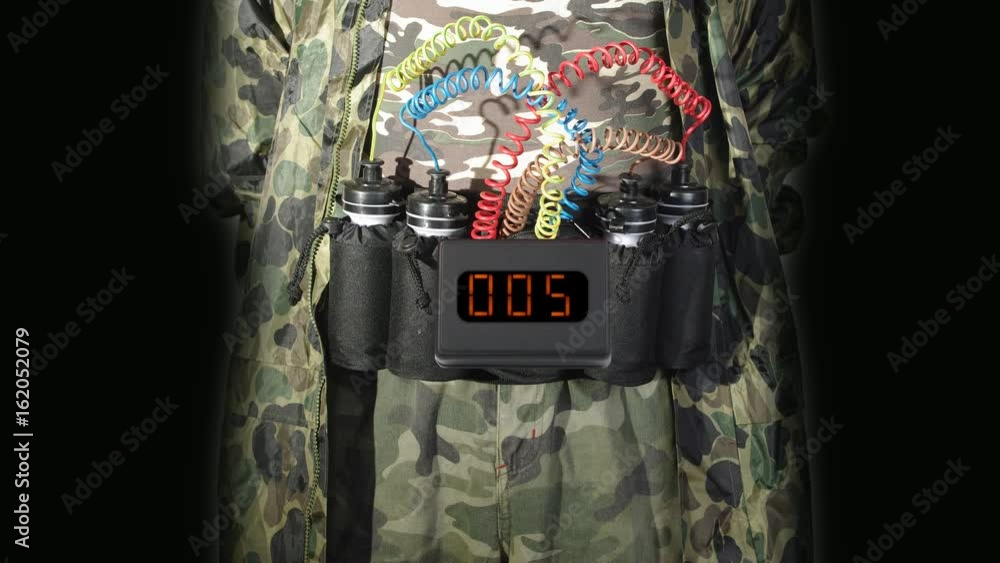 Midsection of suicide bomber with explosive belt and digital countdown ...