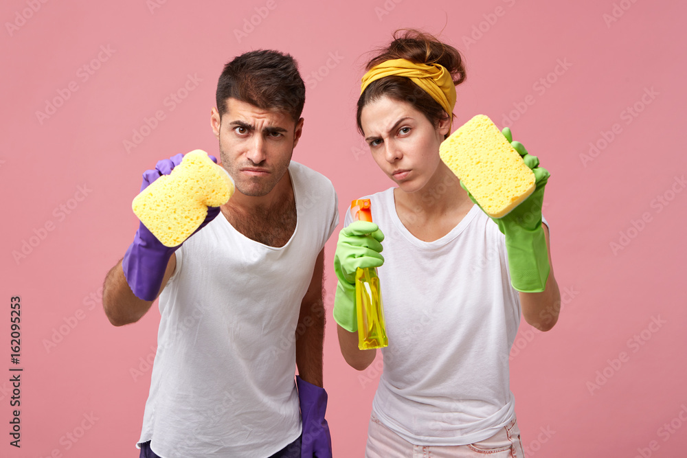 Determined and serious young European male and female obsessed with ...