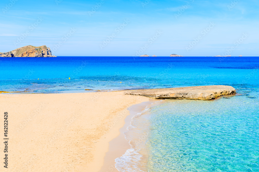 Beautiful sandy Cala Comte beach with azure blue sea water, Ibiza ...