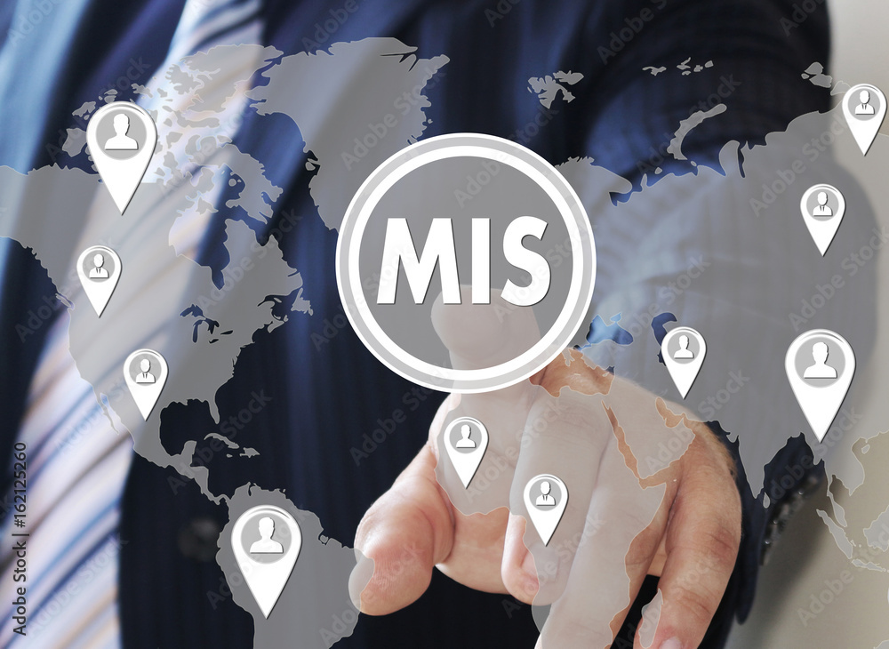 Businessman pushes a button MIS, Management Information System on the ...