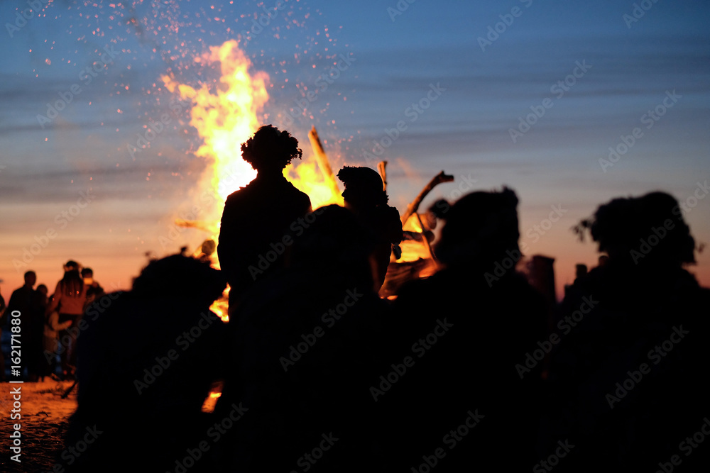 Celebrating the summer solstice on the shore of the Gulf of Riga ...