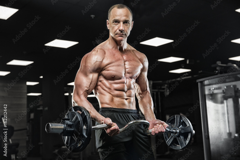 Brutal bodybuilder athletic man with six pack, perfect abs, shoulders ...