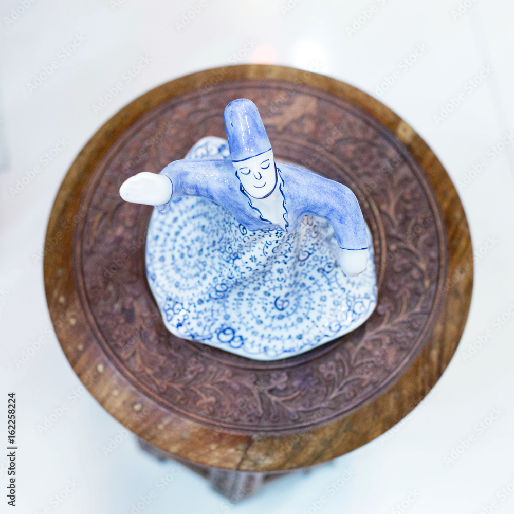 souvenir figure of a dancing Turkish men in traditional costume with a ...