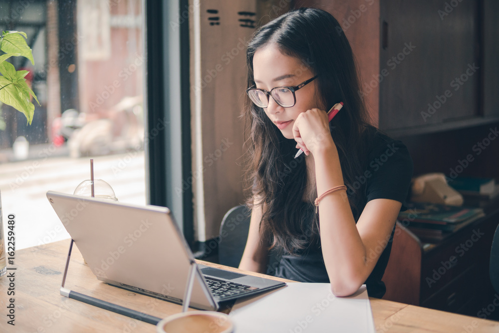business woman thinking and working with laptop computer,successful ...