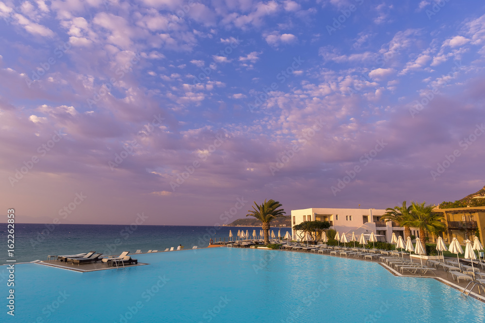 Rhodos, Greece - August 2016: Beautiful sunset over a beach resort with ...