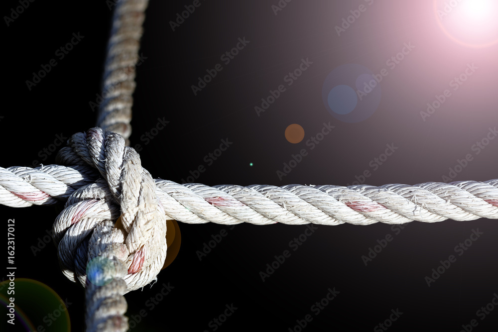 Nylon Rope Knot four ways, difficult hard to solve, black background ...