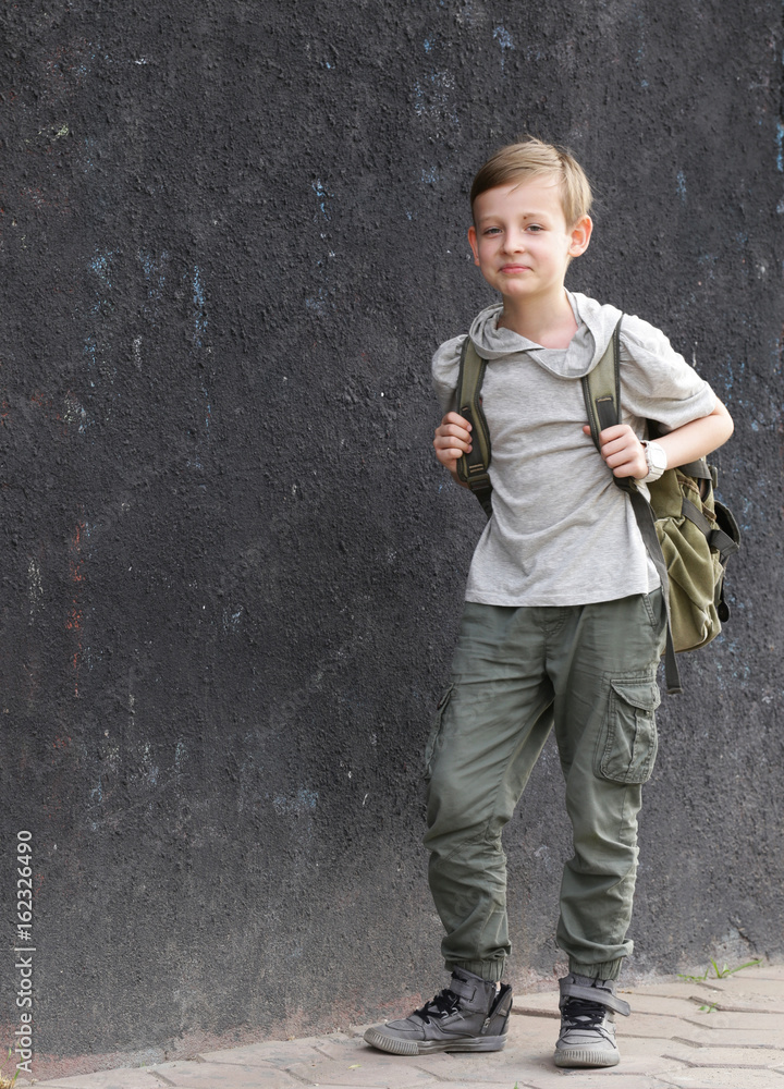 Boy with a backpack ready for adventure and travel Stock Photo | Adobe ...