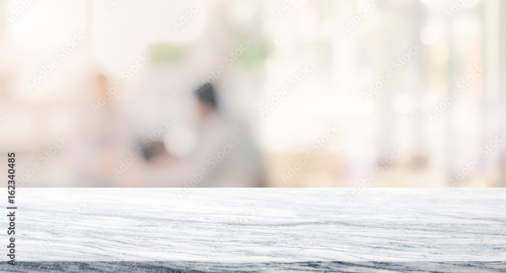 White Stone table top and blurred restaurant interior background with ...