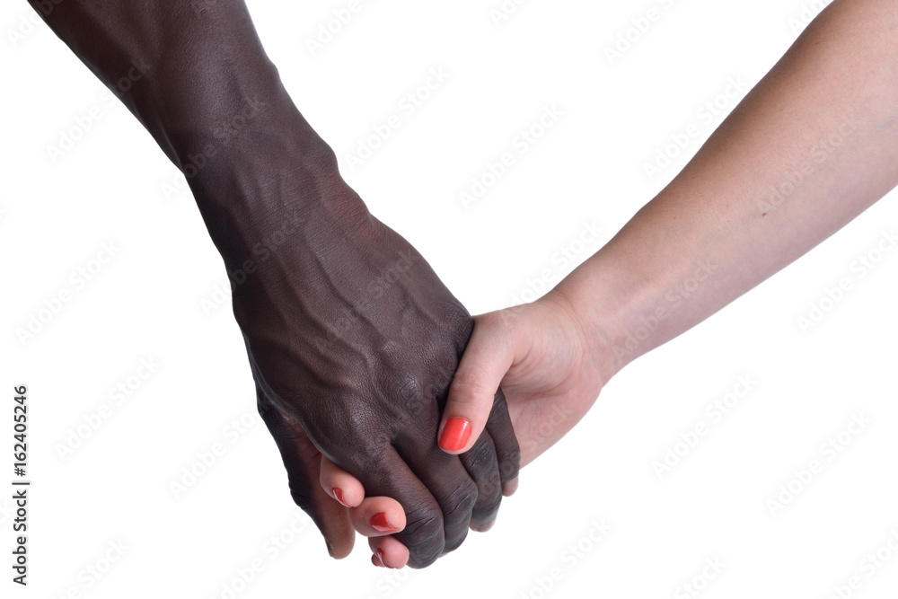 One caucasian and one african hand on white background Stock Photo ...