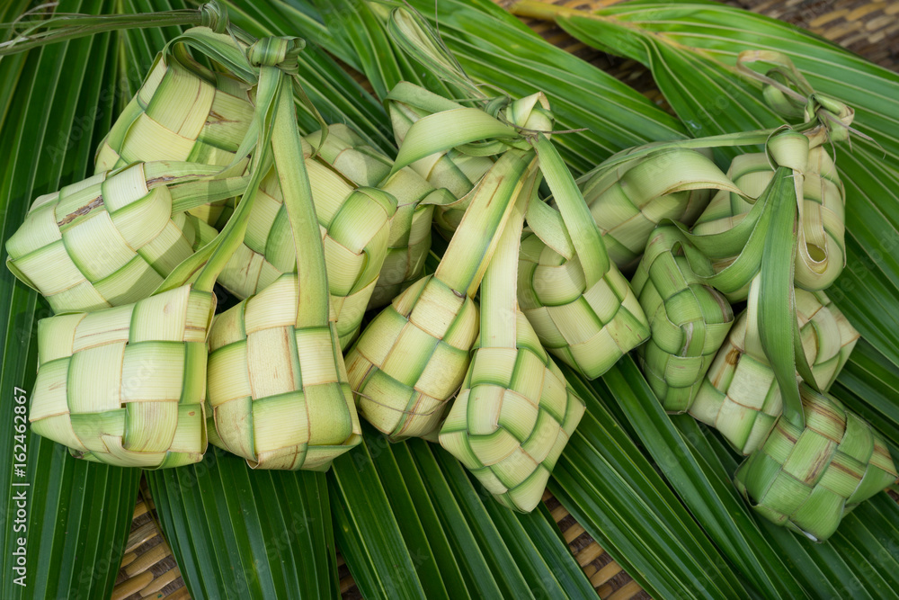 Ketupat, Kupat or Tipat is a type of dumpling made from rice packed ...