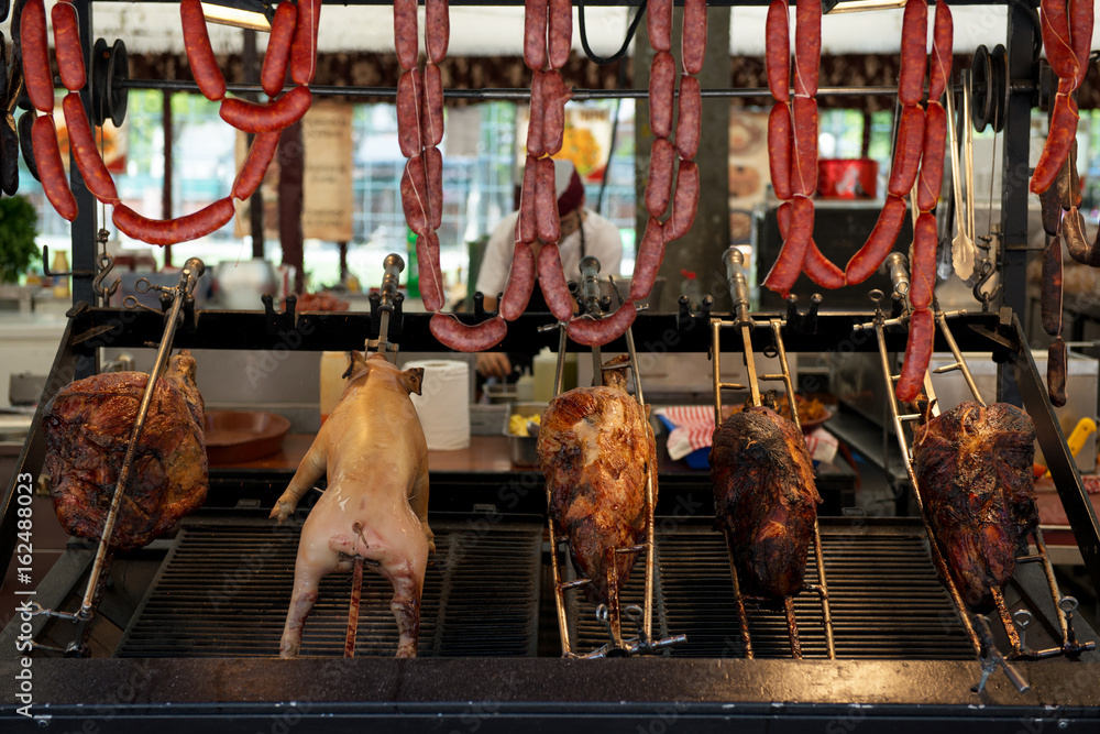Street food in San Fermin feast, Pamlona, Navarra, Spain. Pork. Grilled ...