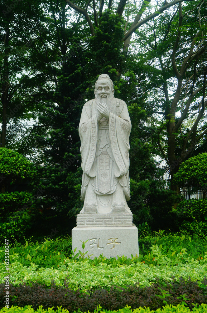 The statue of Confucius, an ancient educationalist in China Stock Photo ...