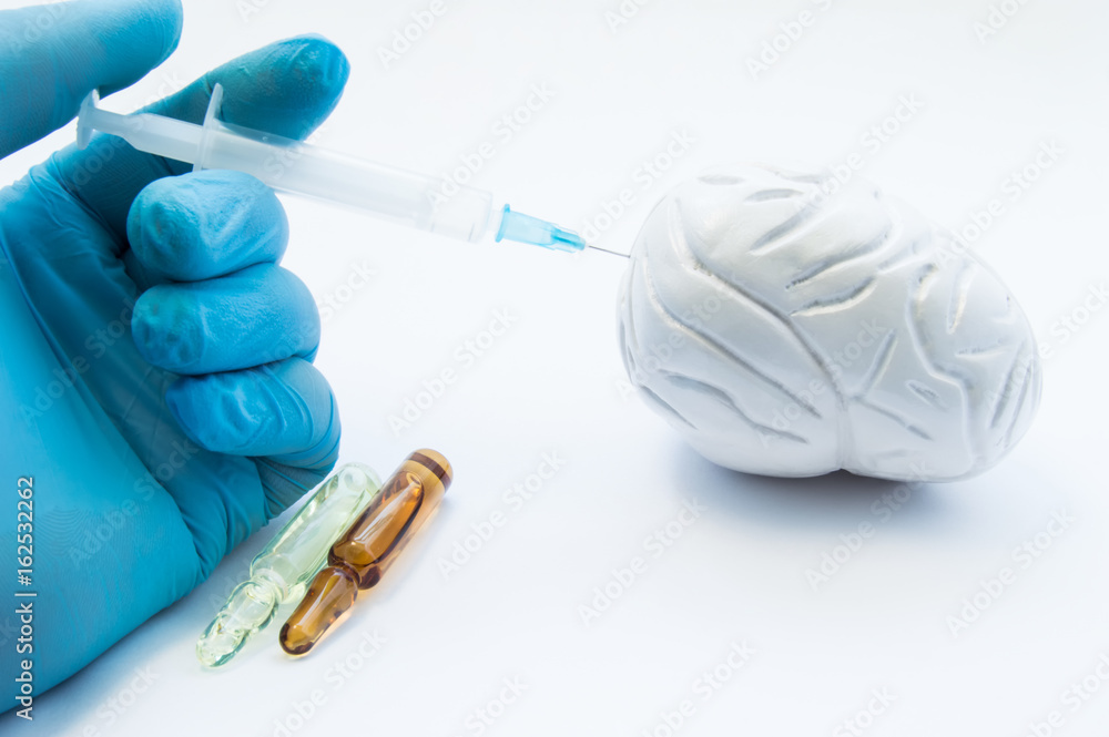 Doctor conducts brain treatment by injecting medication using syringe ...