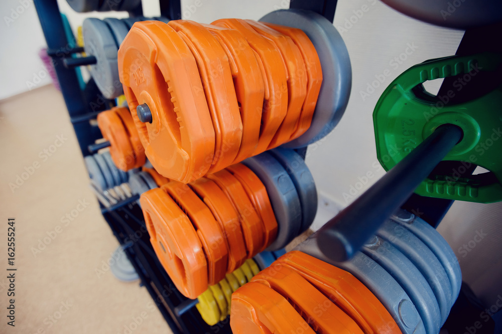 disc for the bar is in the stack in the gym for crossover. Concept ...