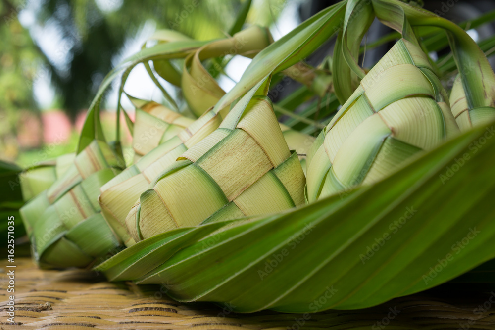 Ketupat, Kupat or Tipat is a type of dumpling made from rice packed ...