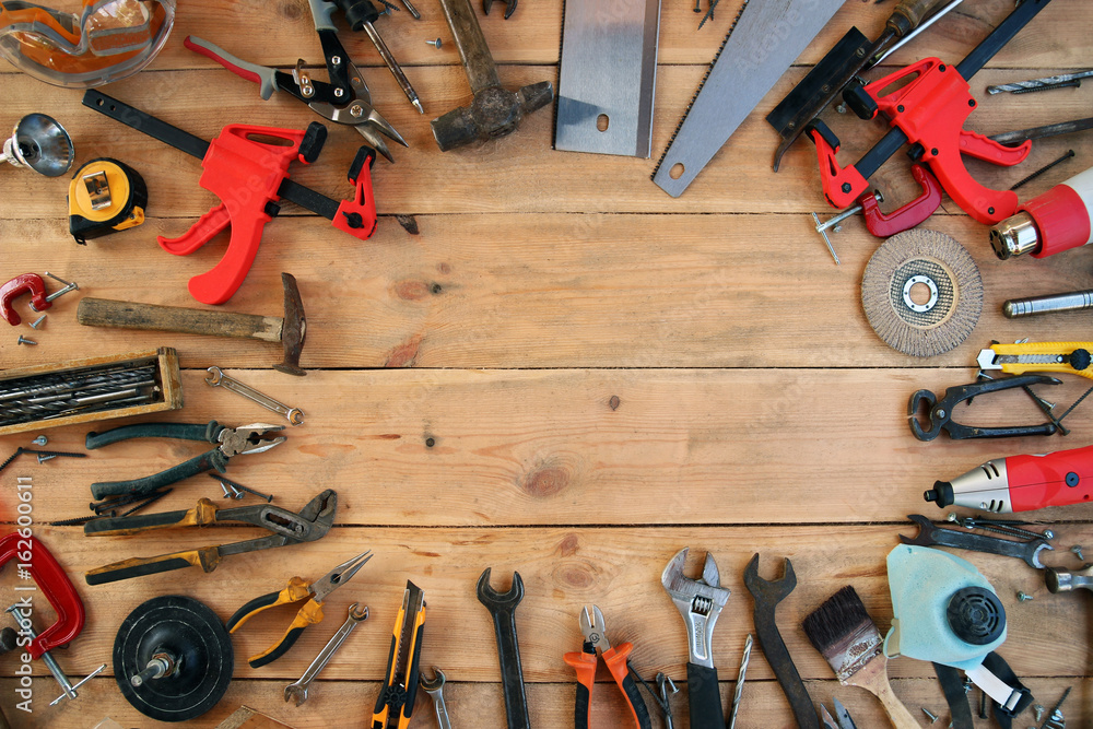 industrial tools on light wooden background with copy space. top view ...