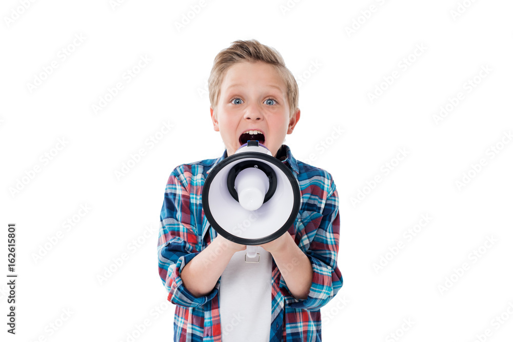 Cute little boy screaming in megaphone and looking at camera Stock ...