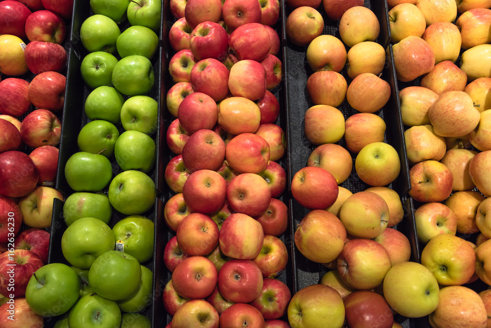 Colorful pile of fresh red, green, yellow apples for sale at local ...