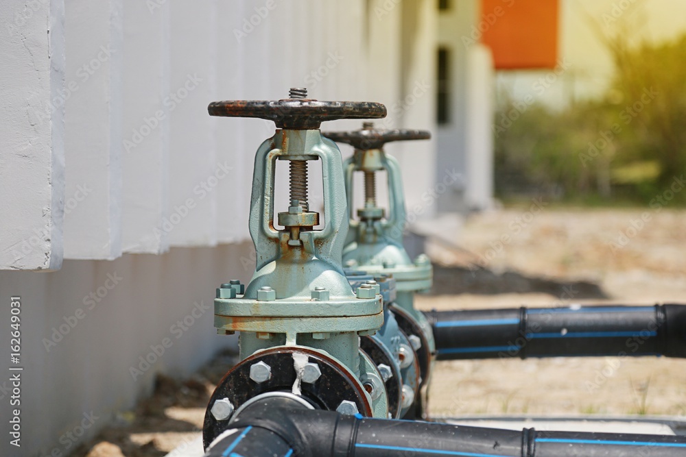 Big gate valve with polyethylene big water pipe line outside the ...