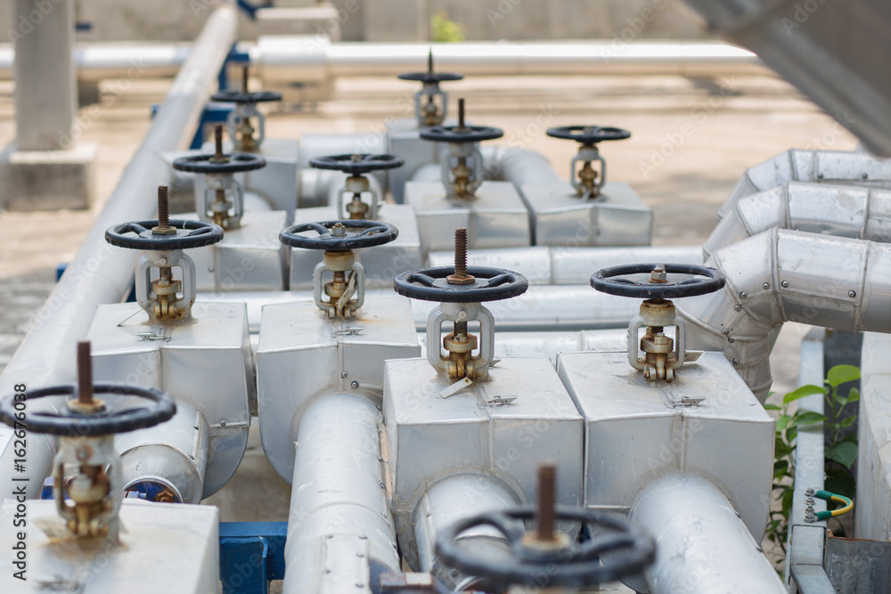 Gate valve in industrial plant Stock Photo | Adobe Stock