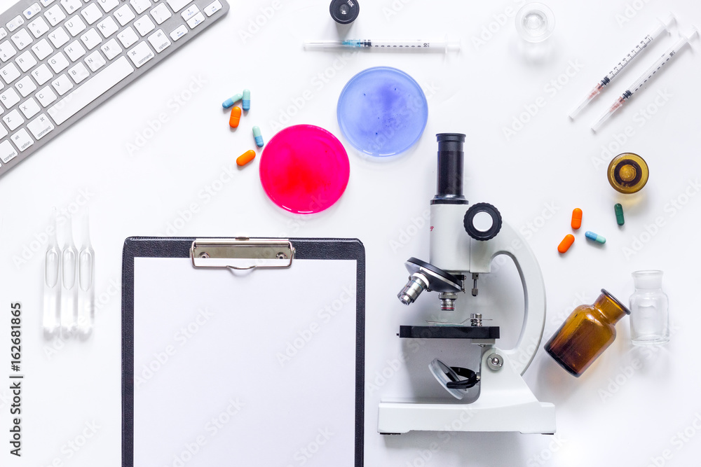 Medical tests. Work table of doctor witn microscope, Petri dish ...