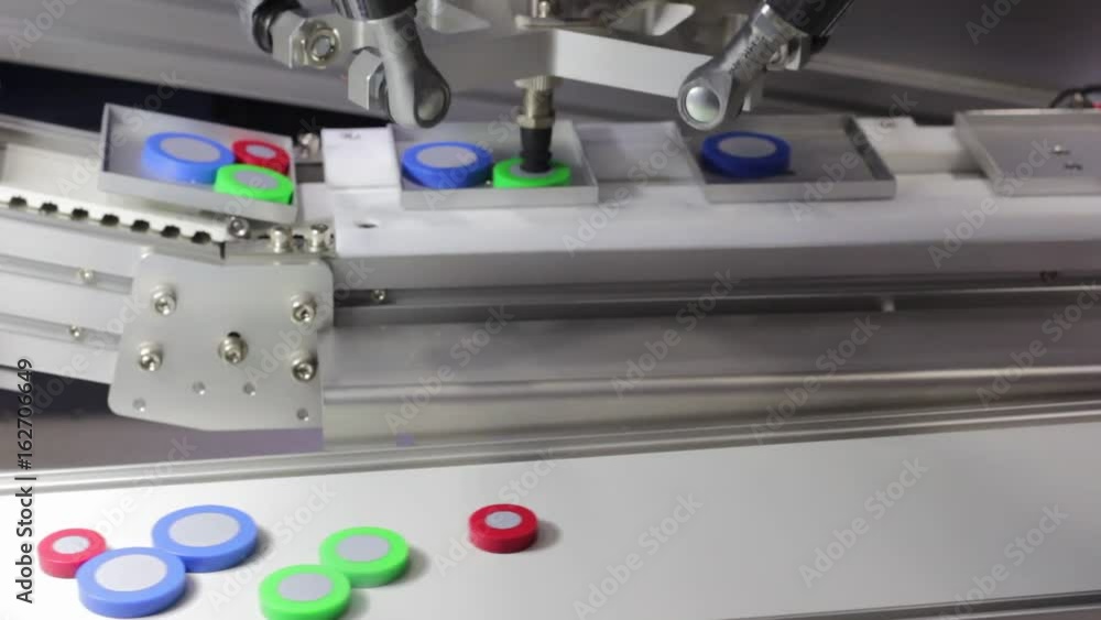 Robotic arm pick and place automation;process of picking parts up and ...