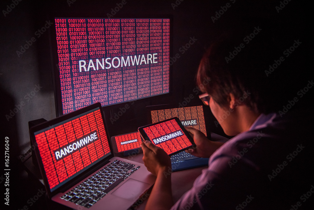 Young Asian male frustrated, confused and headache by ransomware attack ...