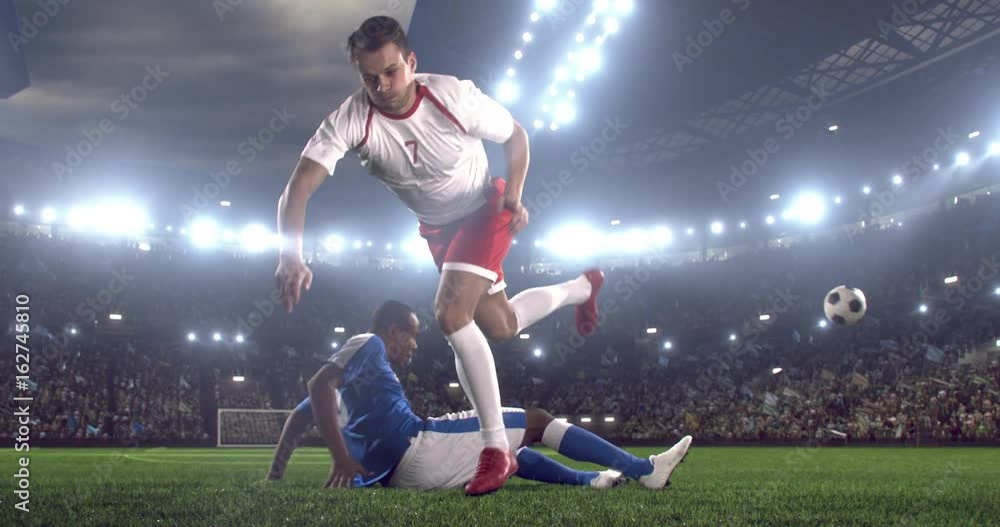 4k footage of a soccer player in dramatic play during a soccer game on ...