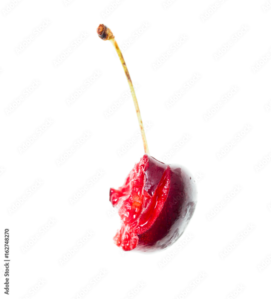 Poster One bitten cherry on a white background – Wall Art | UkPosters