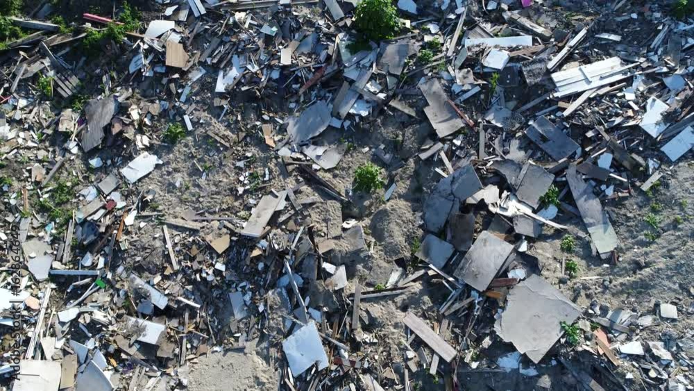 Aerial top down view of landfill site drone camera tilting down showing ...