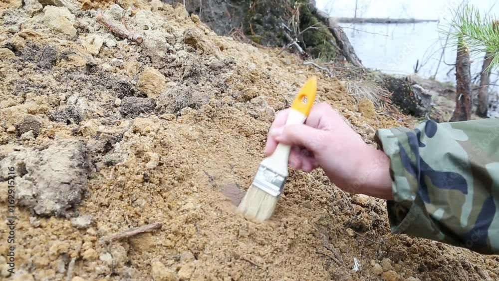 Archaeology: discovery of a piece of ancient pottery in the dump soil ...