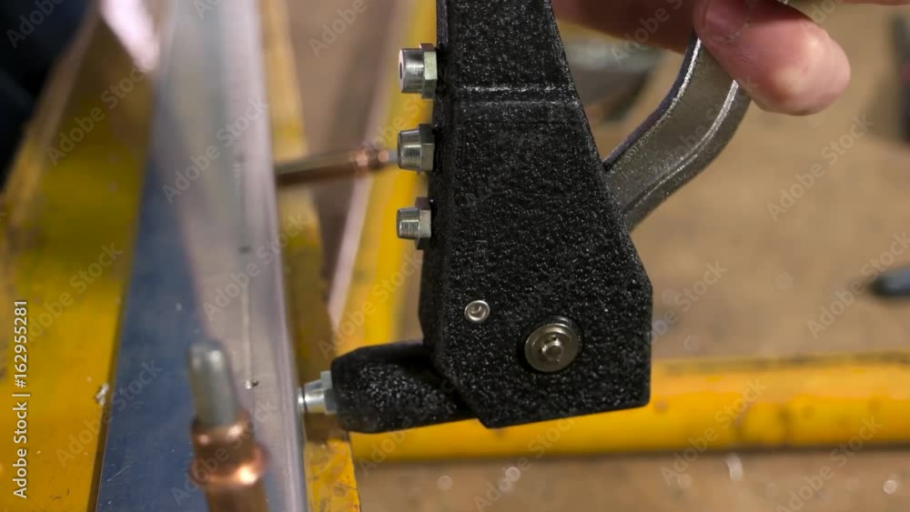 Rivet gun close up. Tool riveting metal detail. Stock Video | Adobe Stock