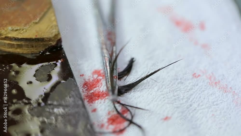 Bloody tools on white bloodstained towel Stock Video | Adobe Stock